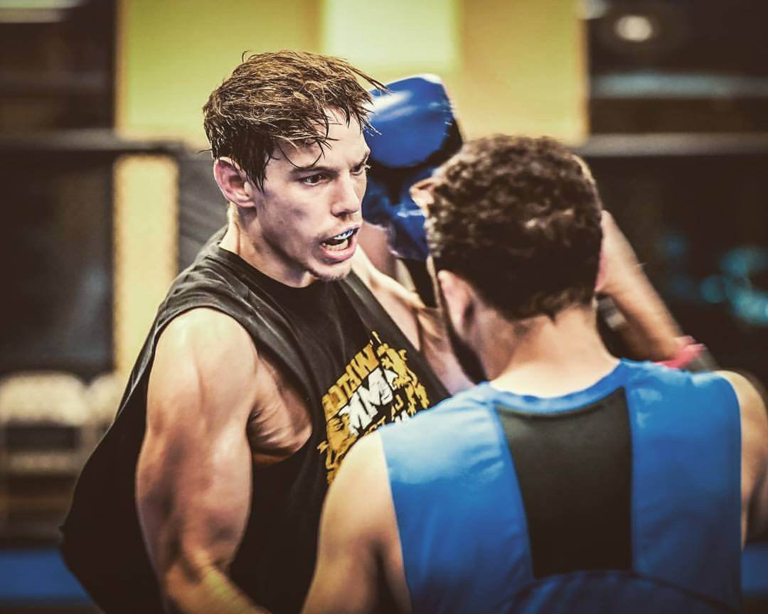 Kickboxing sparring Jordan sm | Rothwell Mixed Martial Arts